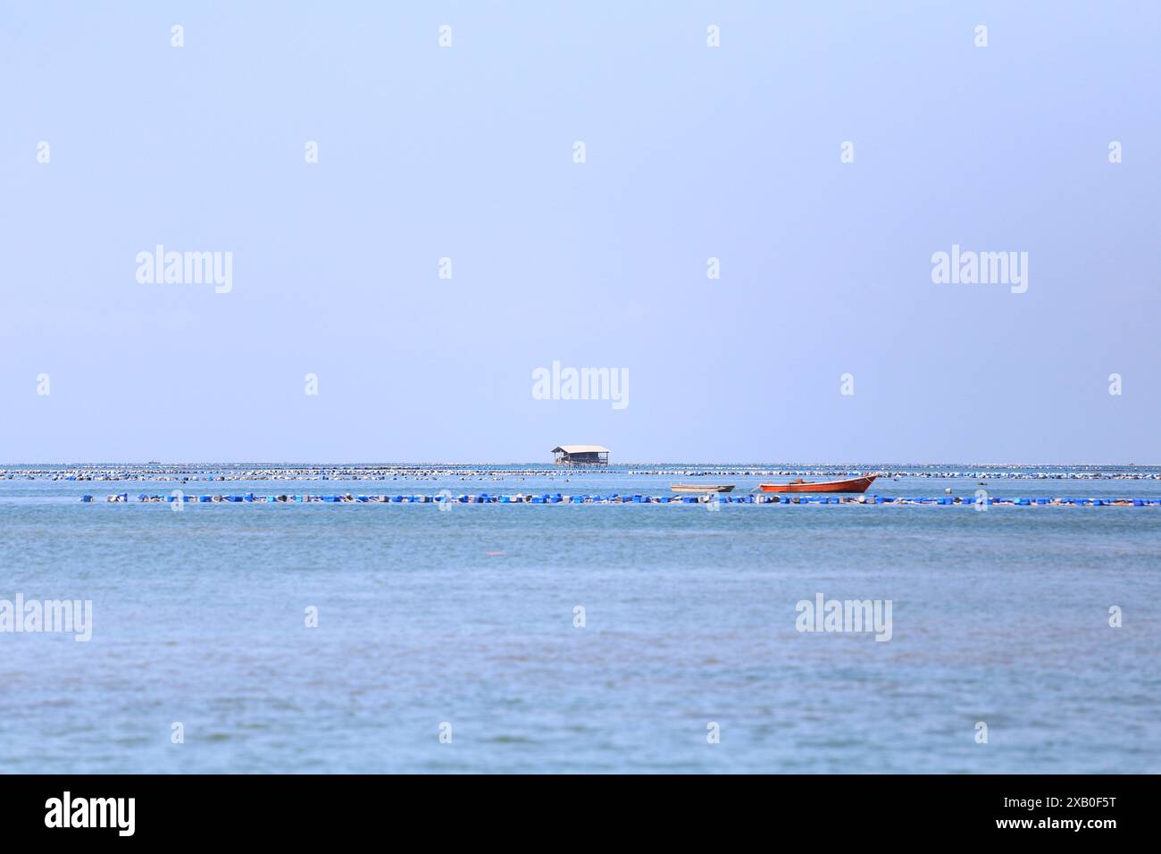 The home of a fisherman who raised oysters in the sea, Business farm of ...