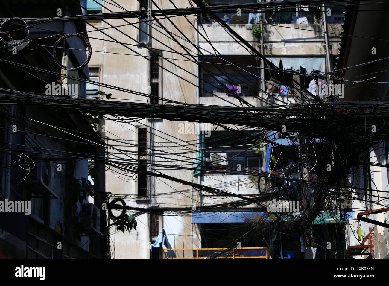 Cable wires on the electric poles are tangled,Messy signal line for ...