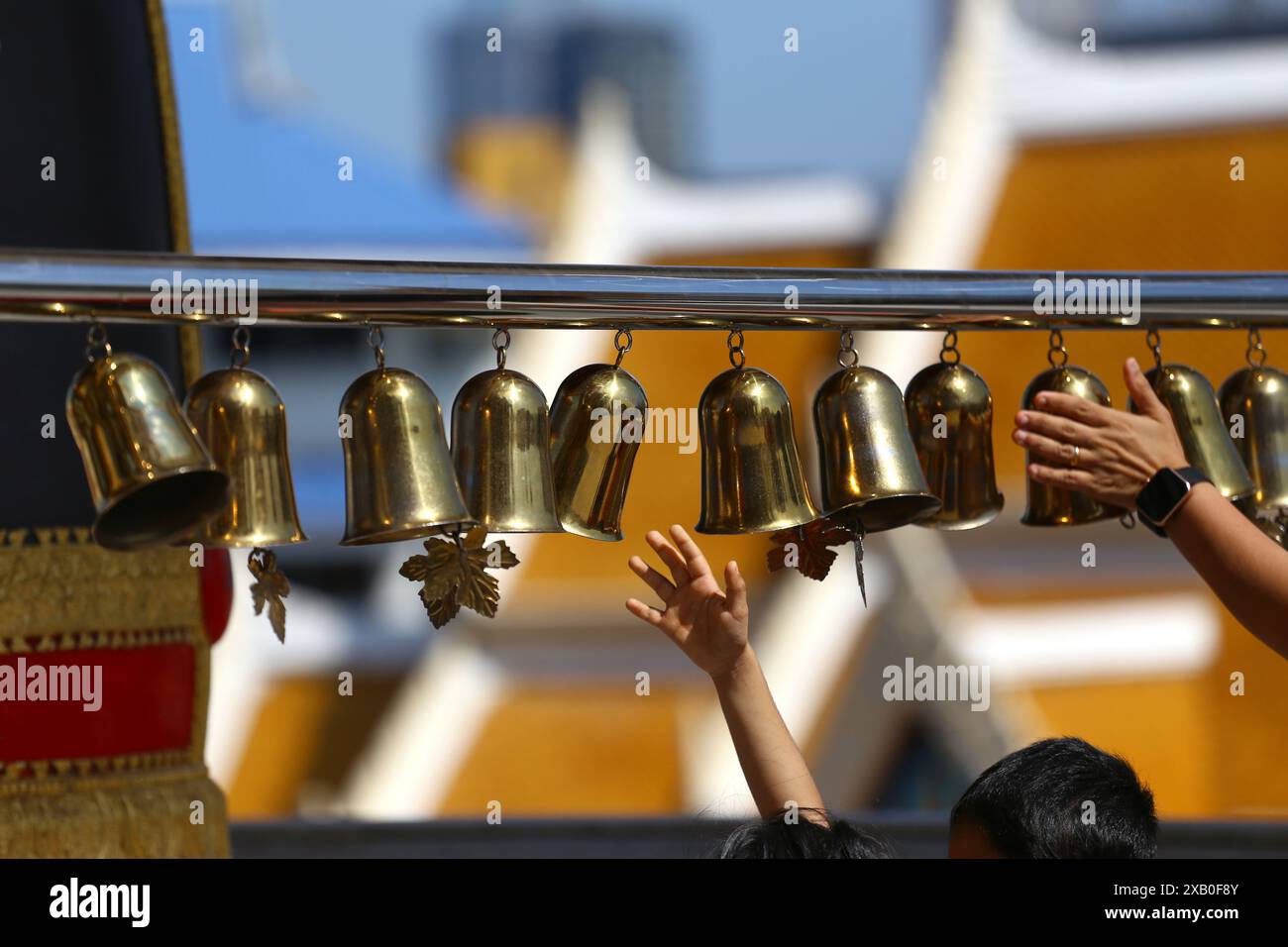 Small golden bell hung for Buddhists, The belief in ringing the bell is ...