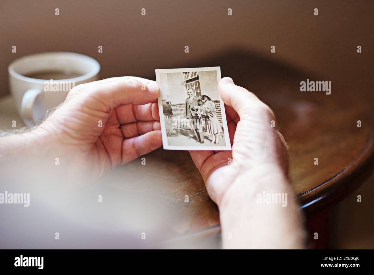 Holding, hands and photo of couple for memory with love, nostalgia and ...