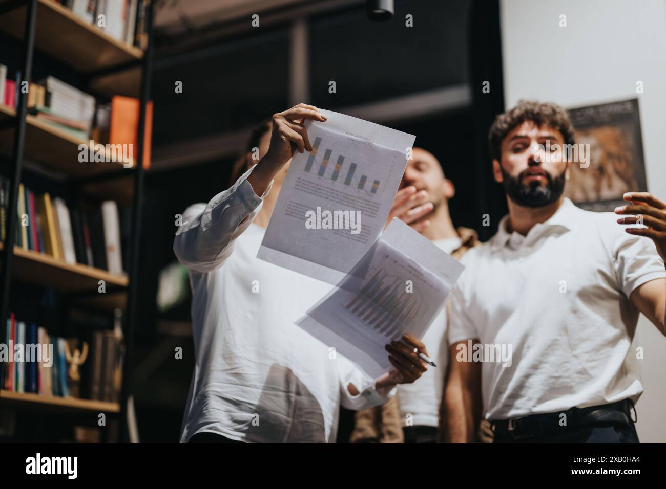 Successful Business Partners Discussing Project Details and Analyzing ...