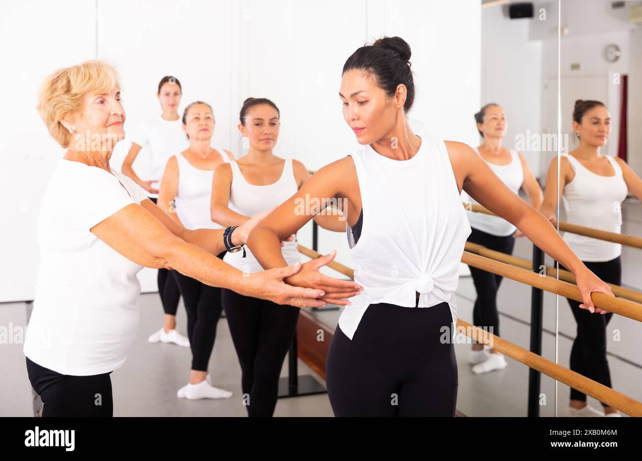 Dancing Asian woman standing in a ballet stance, where the ...