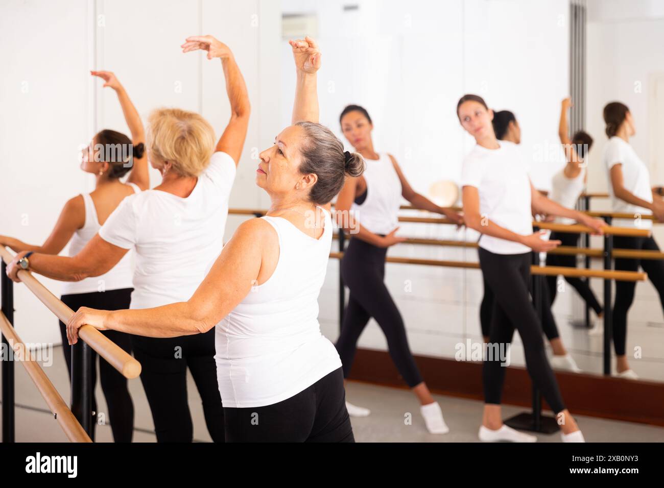 Group of women doing ballet dance moves Stock Photo - Alamy