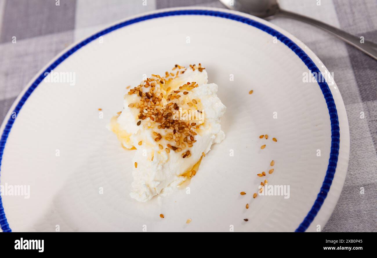 Traditional Catalan mato con miel, delicate whey cheese made from sheep ...