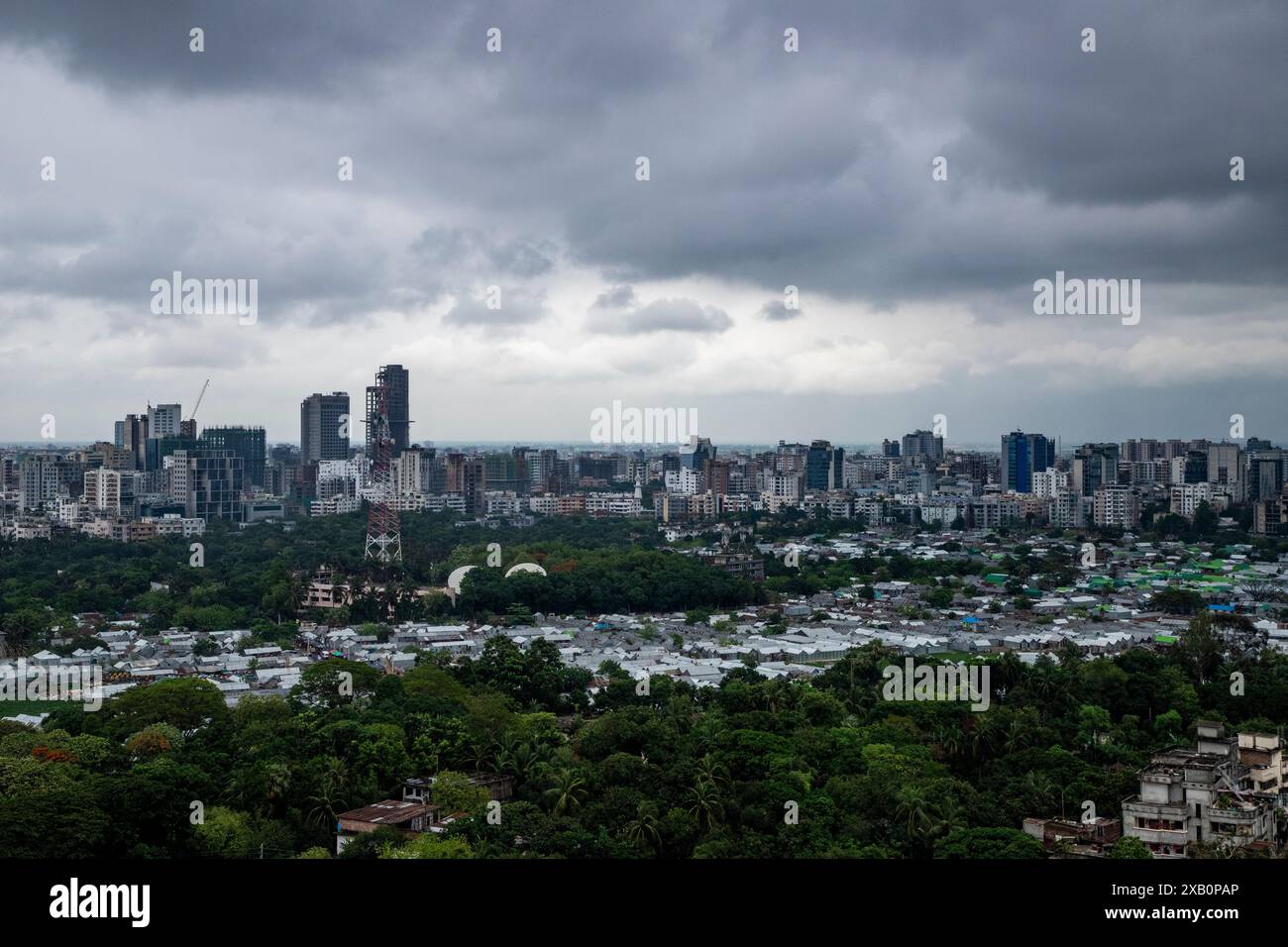 aerial view of densely Dhaka’s Korail Slum and Gulshan-Banani area ...