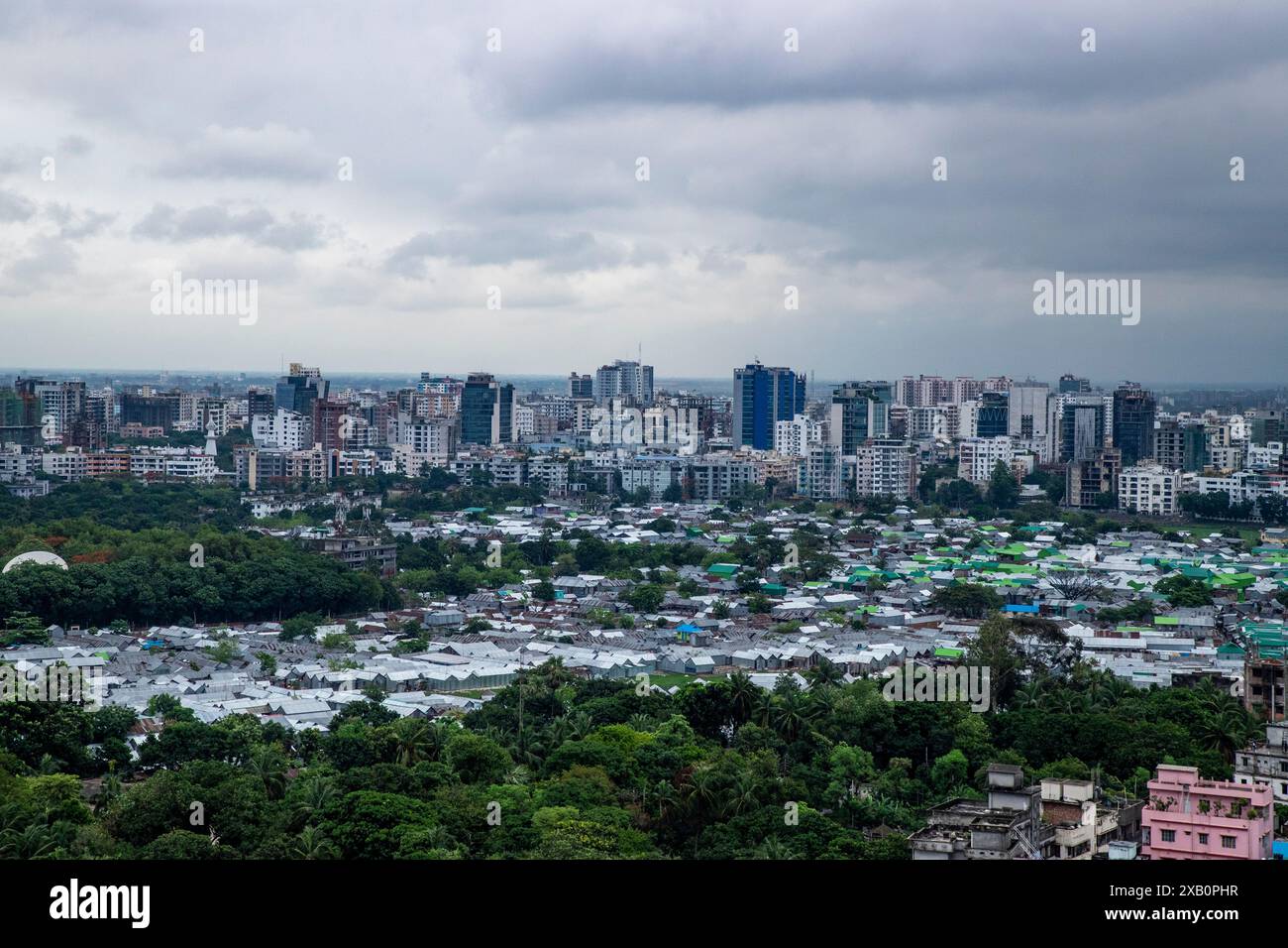 aerial view of densely Dhaka’s Korail Slum and Gulshan-Banani area ...