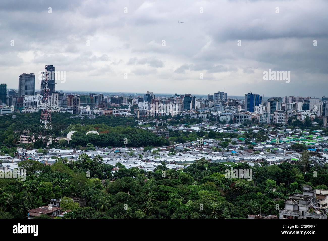 aerial view of densely Dhaka’s Korail Slum and Gulshan-Banani area ...