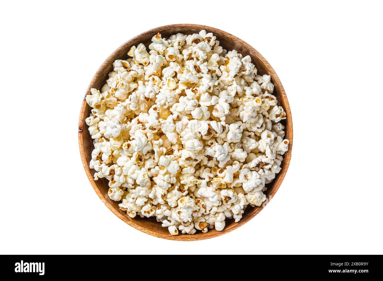Salted popcorn in a wooden plate. Isolated on white background Stock ...
