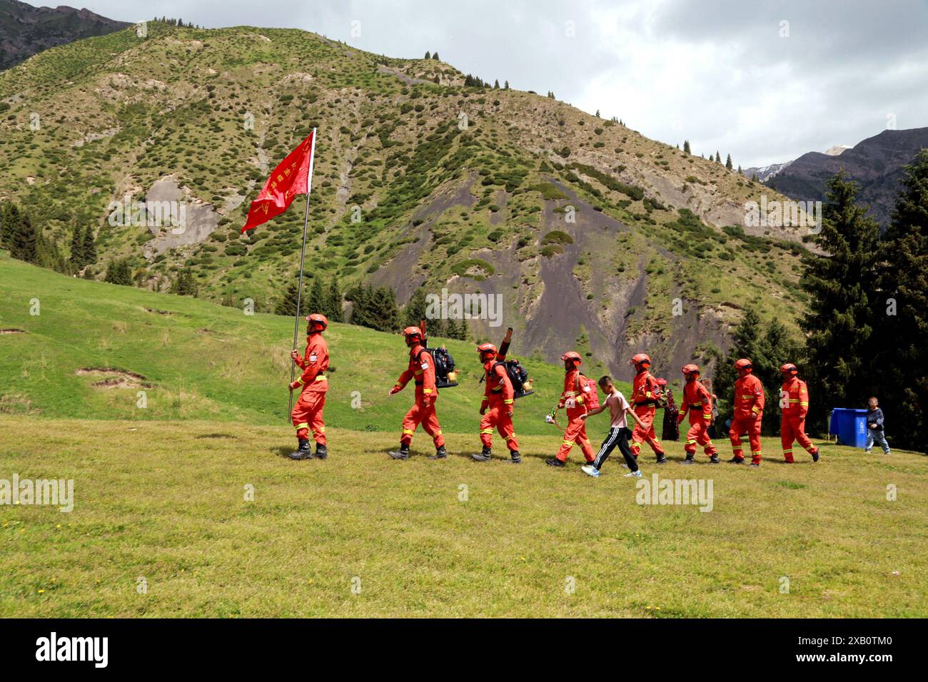 AKSU, CHINA - JUNE 9, 2024 - Forest firefighters patrol a fire in Tomer ...