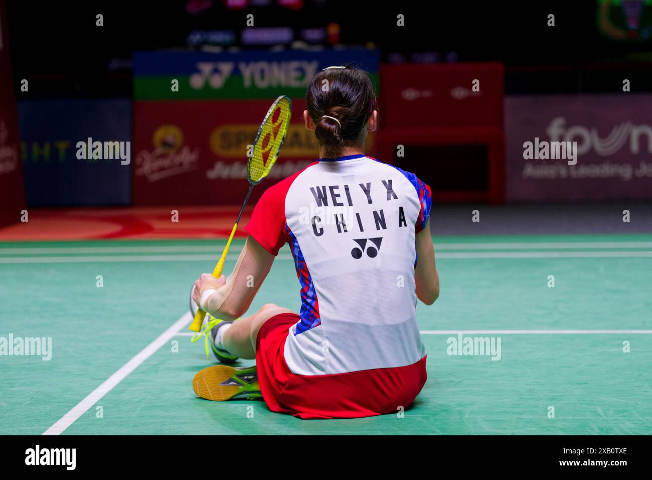 WEI Ya Xin of China celebrates after winning the mixed doubles finals ...