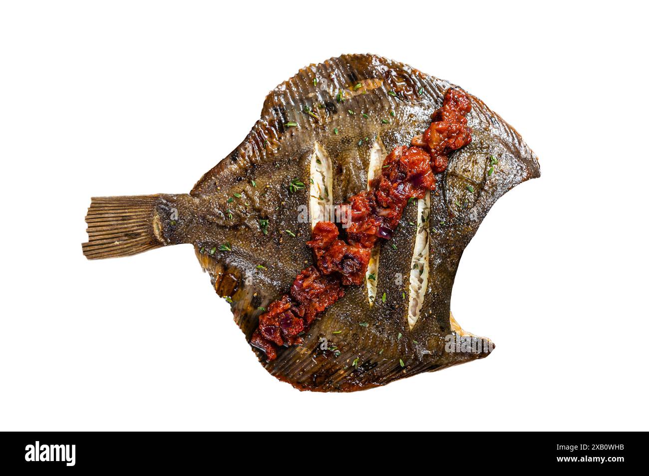 Grilled Flounder or plaice with tomato sauce on wooden cutting board ...