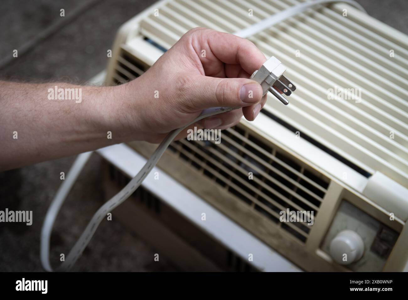 Window air conditioner unit is unplugged for safety before cleaning and ...