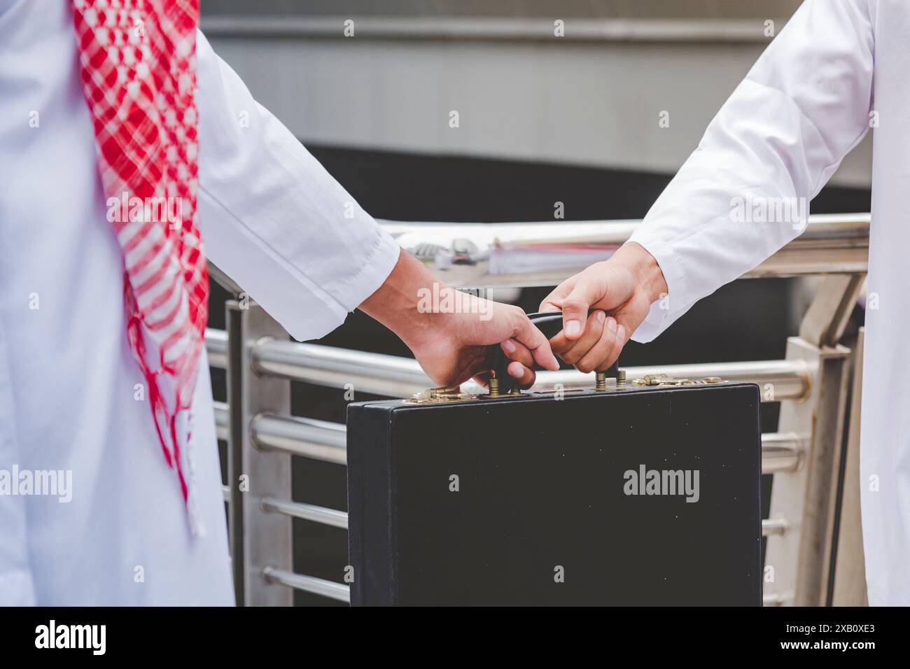 Arab Businessman shaking hands together. Teamwork business partner wear ...
