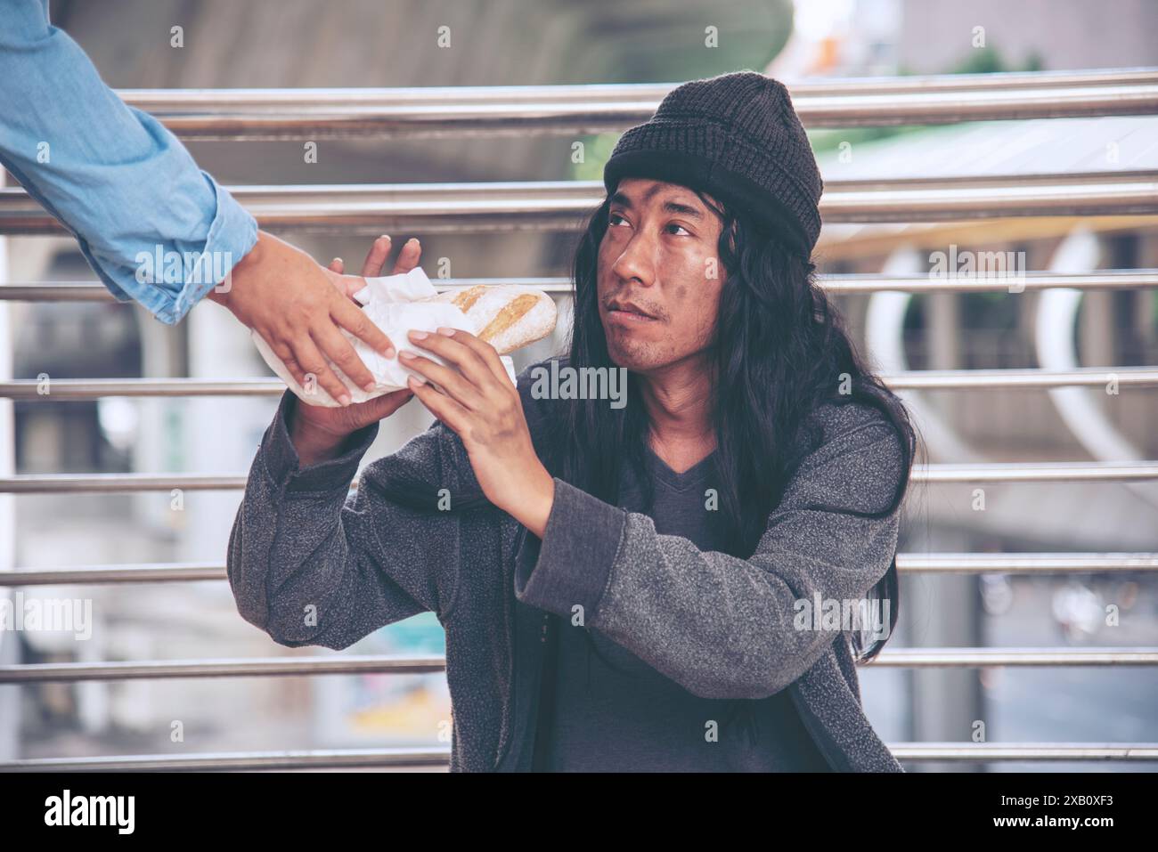 Helping the helpless hi-res stock photography and images - Alamy