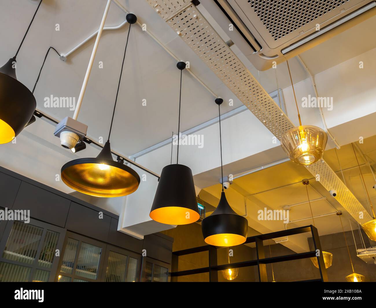 Row of ceiling lights hi-res stock photography and images - Alamy