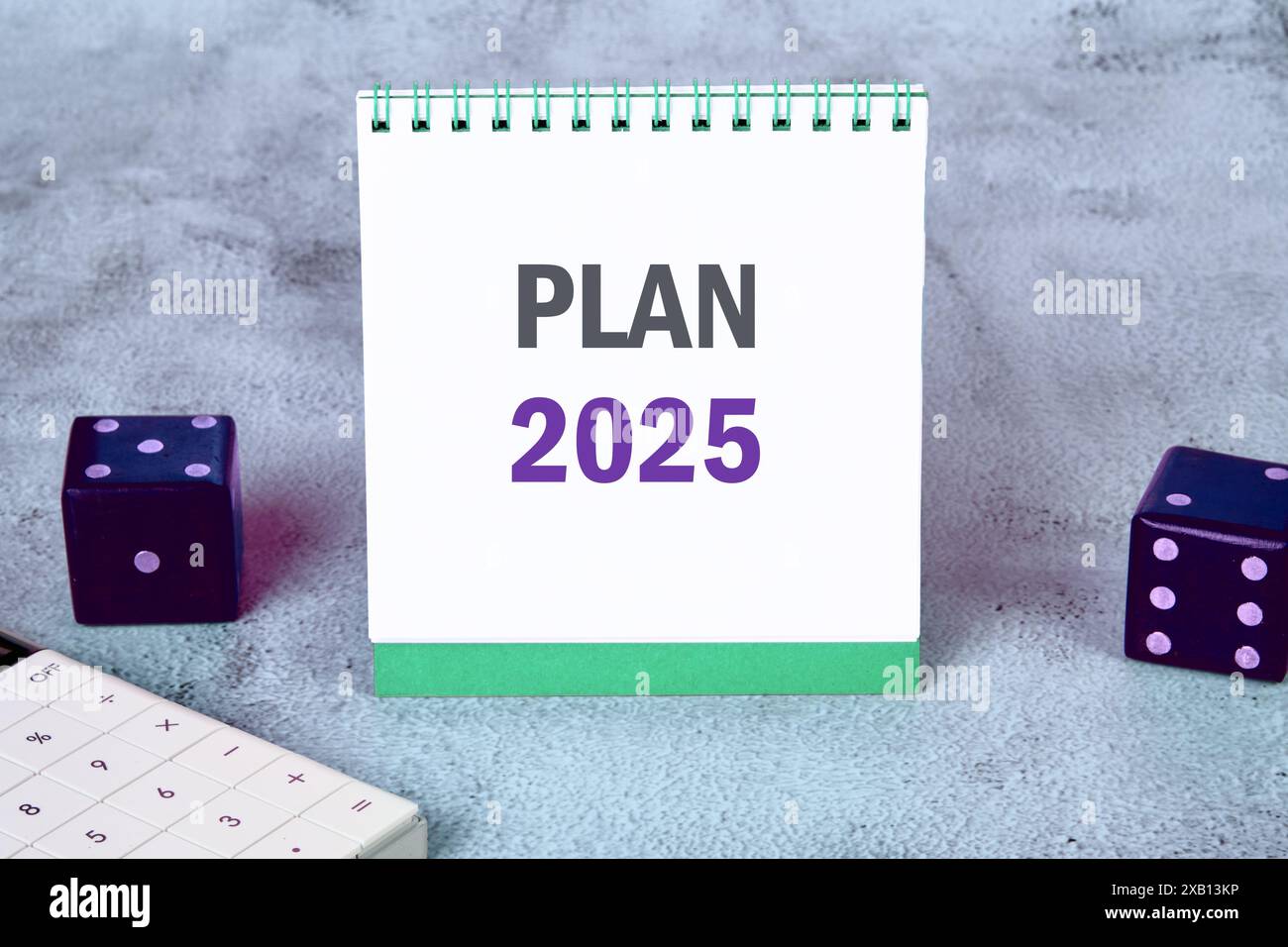 Planning goals and success concept. Text PLAN 2025 on a vertically ...
