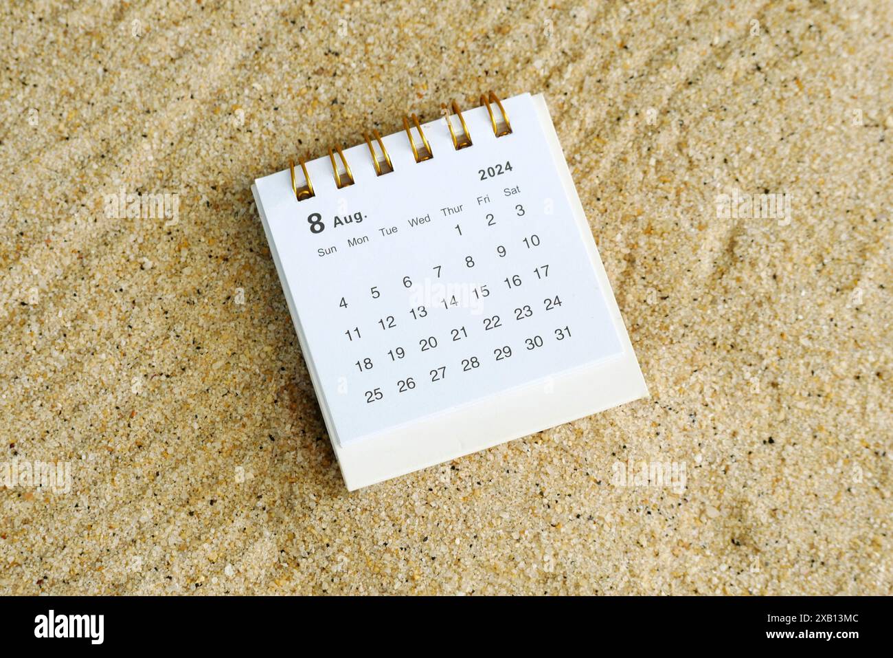 A month calendar august 2024 on the sand Stock Photo - Alamy