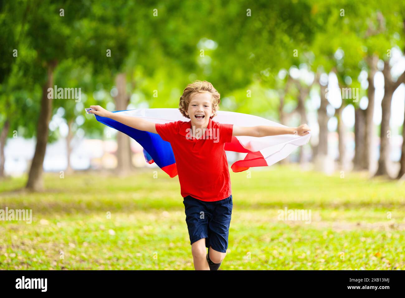 Child running with Czechia flag. Little Czech boy cheering for football ...