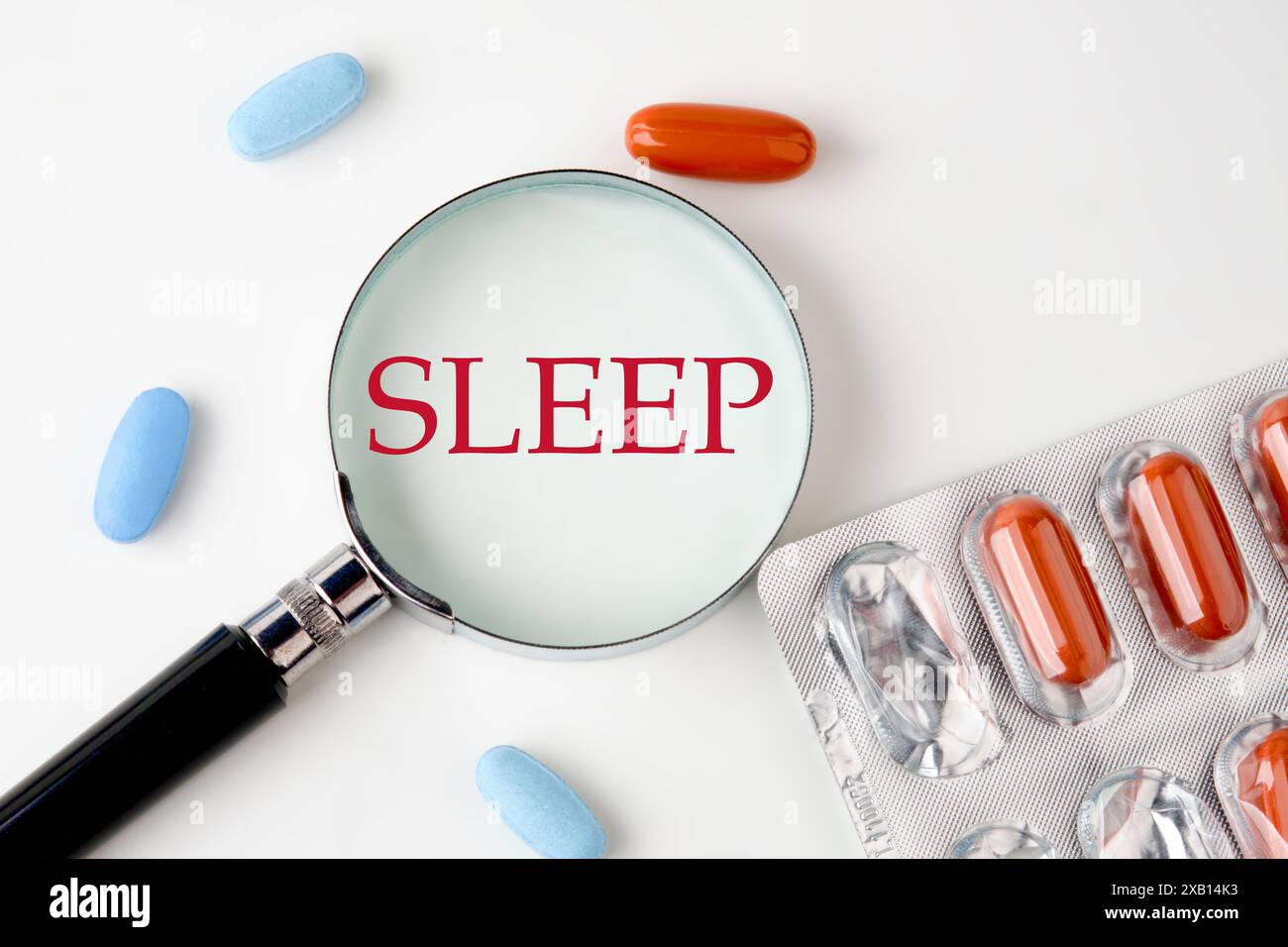 Sleep deep symbol. Word SLEEP written through a magnifying glass next ...