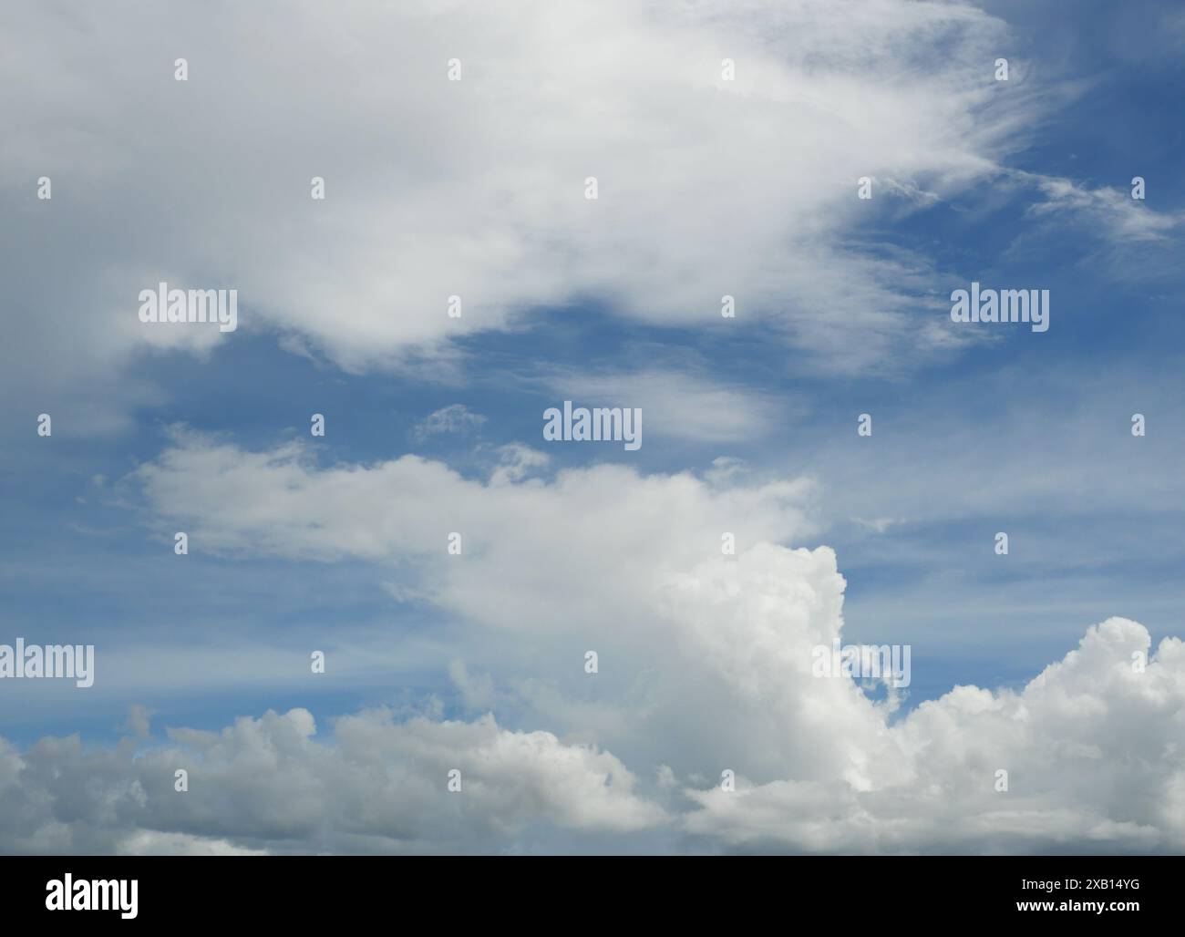 Cumulus cloud on beautiful blue sky in day light , Fluffy clouds formations at tropical zone ...