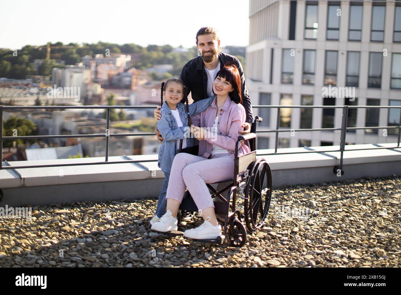 Portrait of young family with disabilities Stock Photo - Alamy
