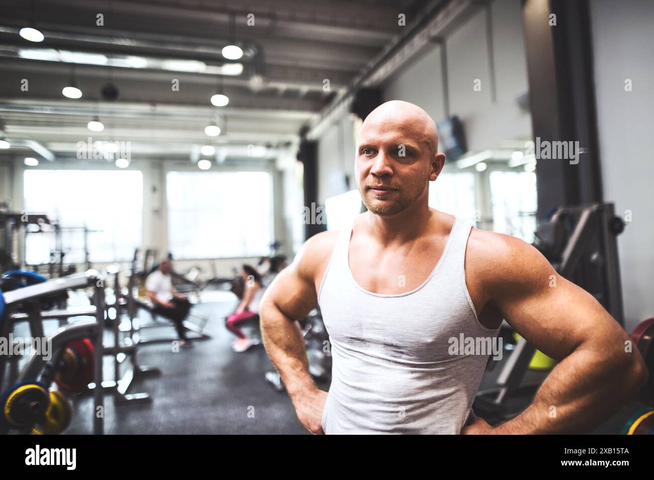 Strong man exercising in gym. Routine workout for physical and mental ...