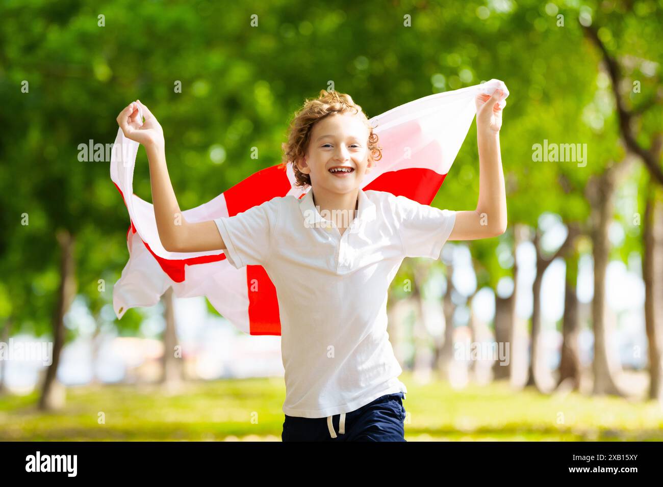 Child running with England flag. English supporter. Little England ...