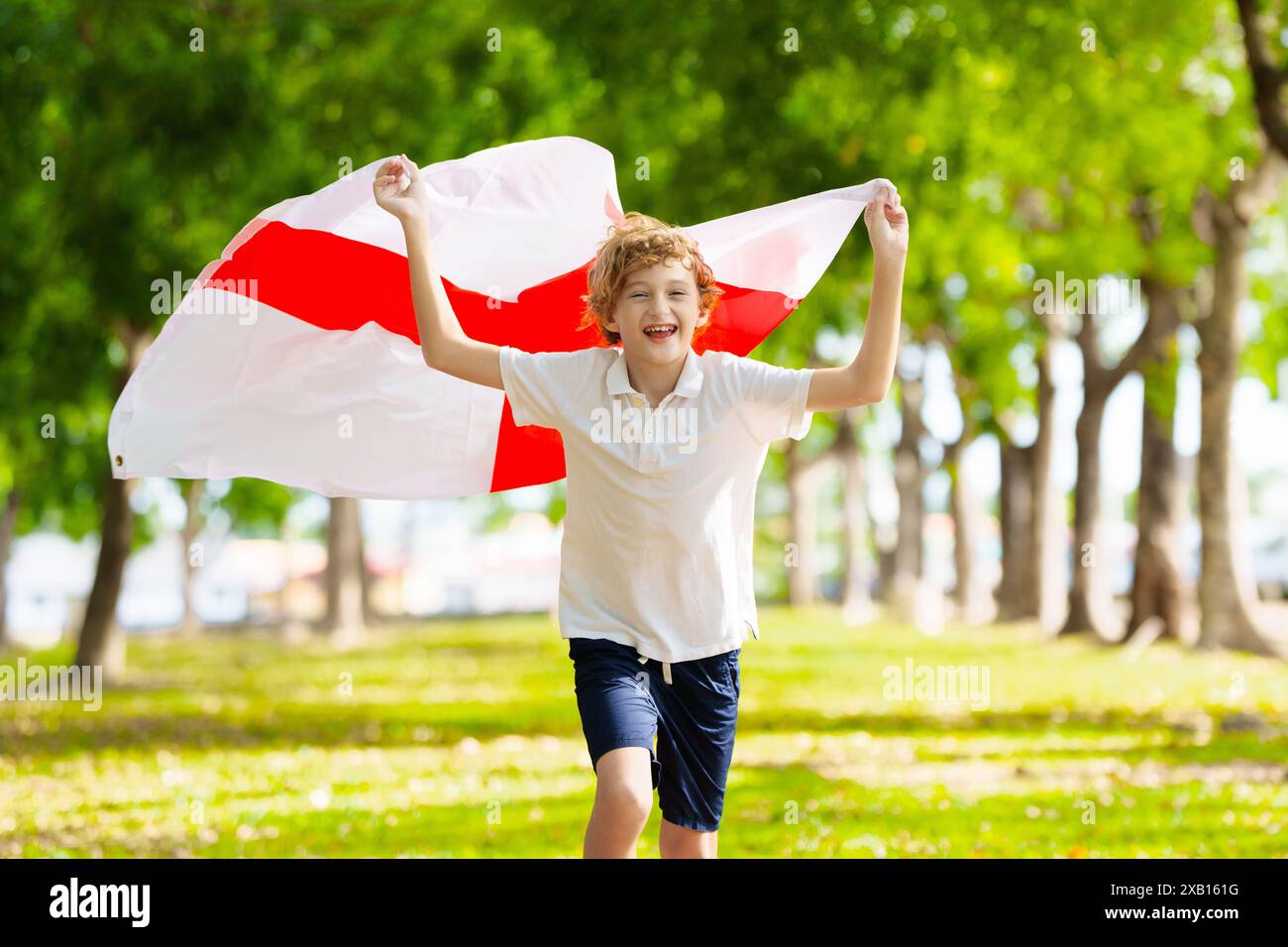 Child running with England flag. English supporter. Little England ...