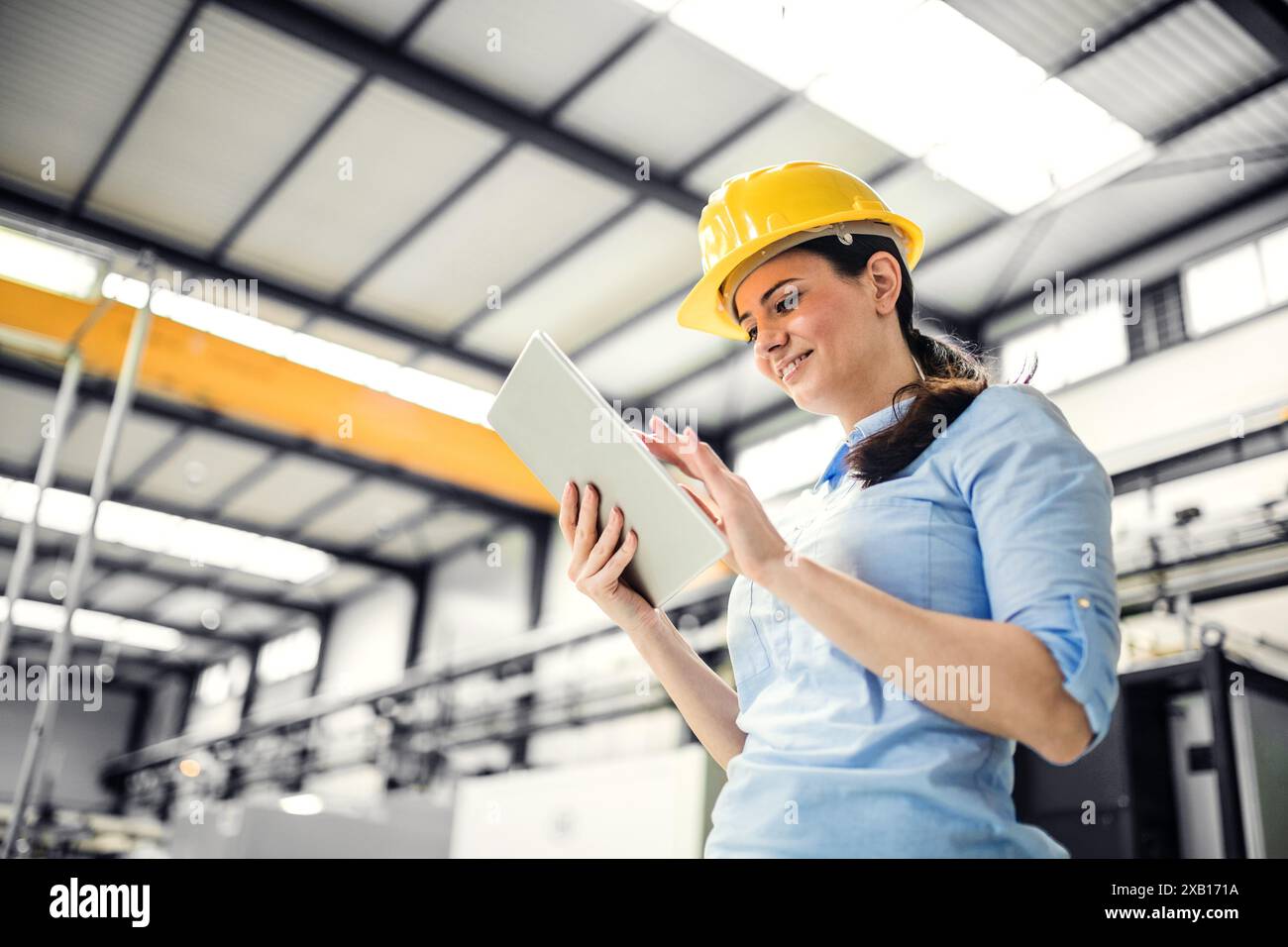 Modern factory female project manager hi-res stock photography and ...
