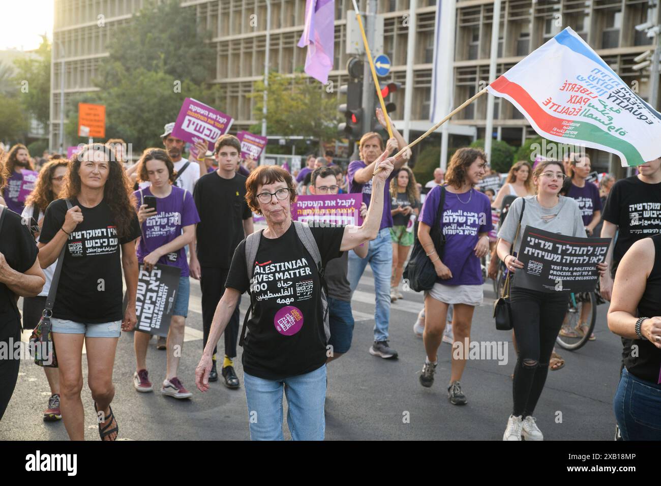 Tel Aviv, Israel. 08th June, 2024. An Israeli peace activist waves a ...