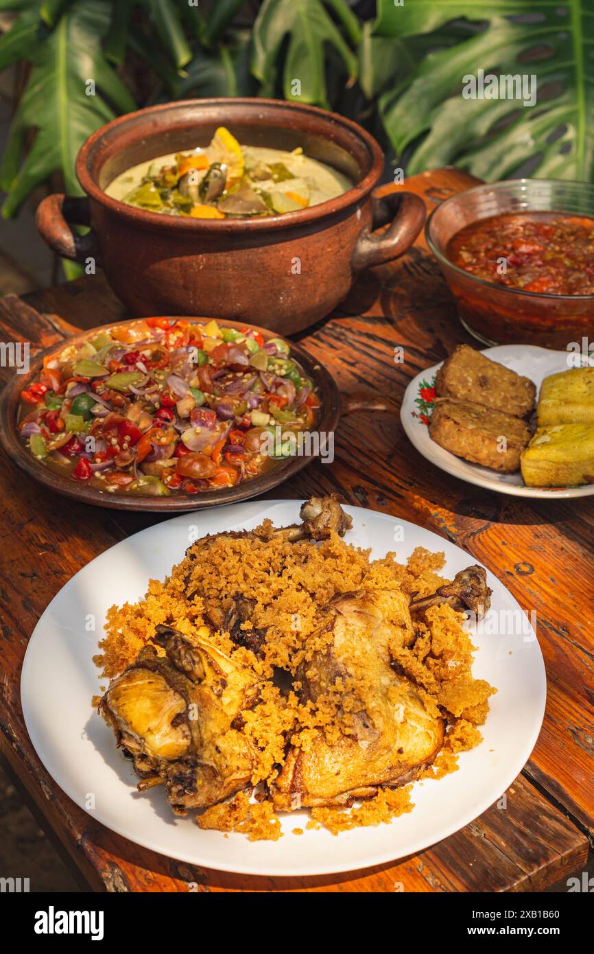 fried chicken with cracker, serve with sambal matah, sayur lodeh and ...