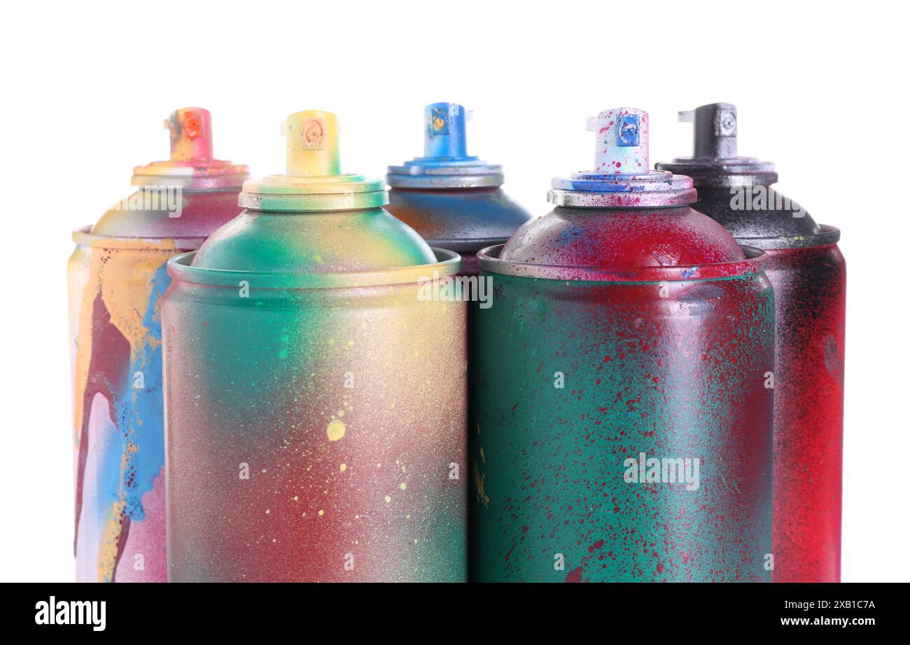 Many spray paint cans isolated on white Stock Photo - Alamy