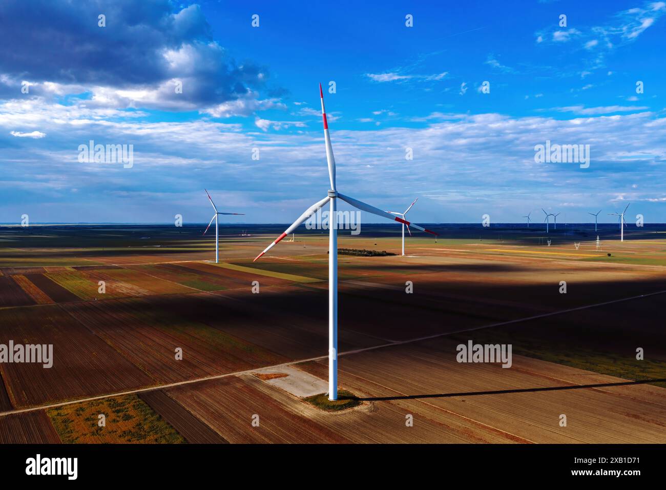 Aerial view of wind turbines on an onshore wind farm, high angle view ...
