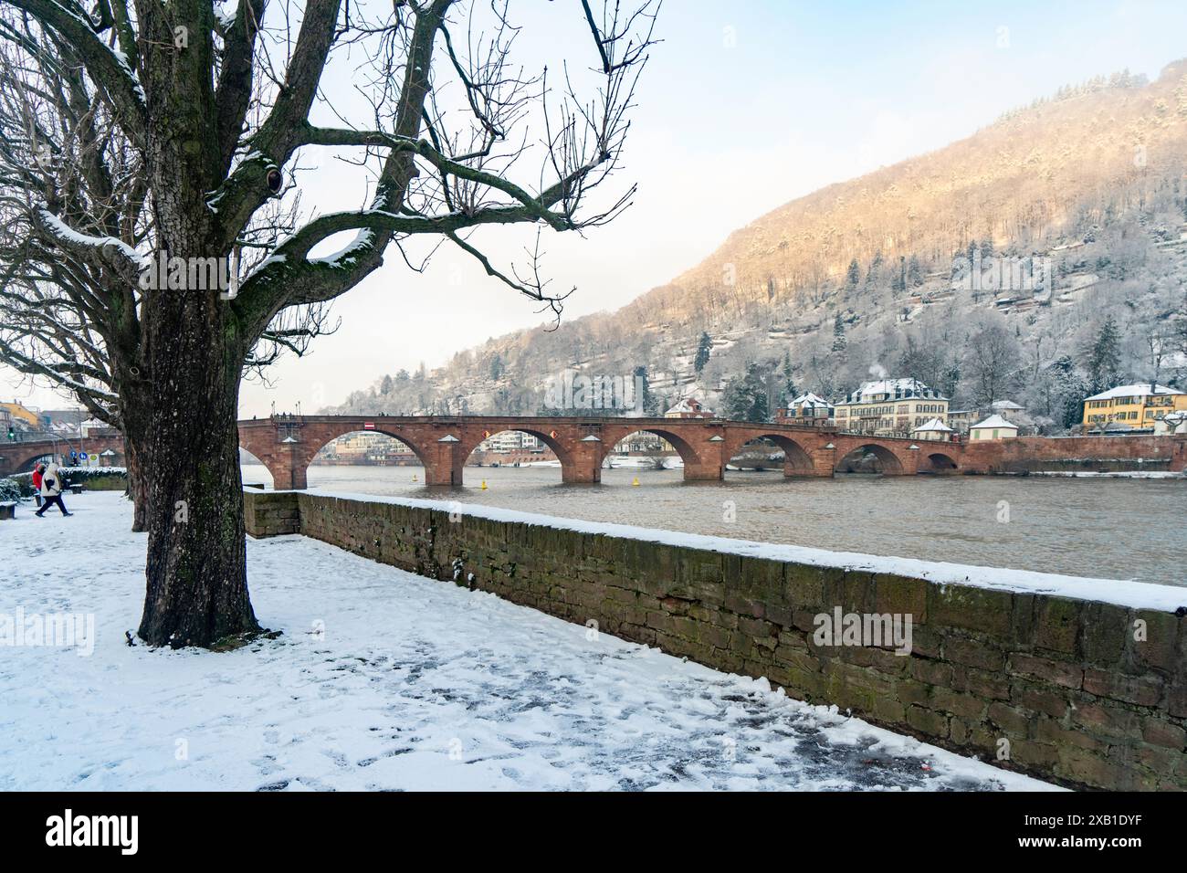 walking through the streets of Heidelberg with snow river Nekar Stock ...