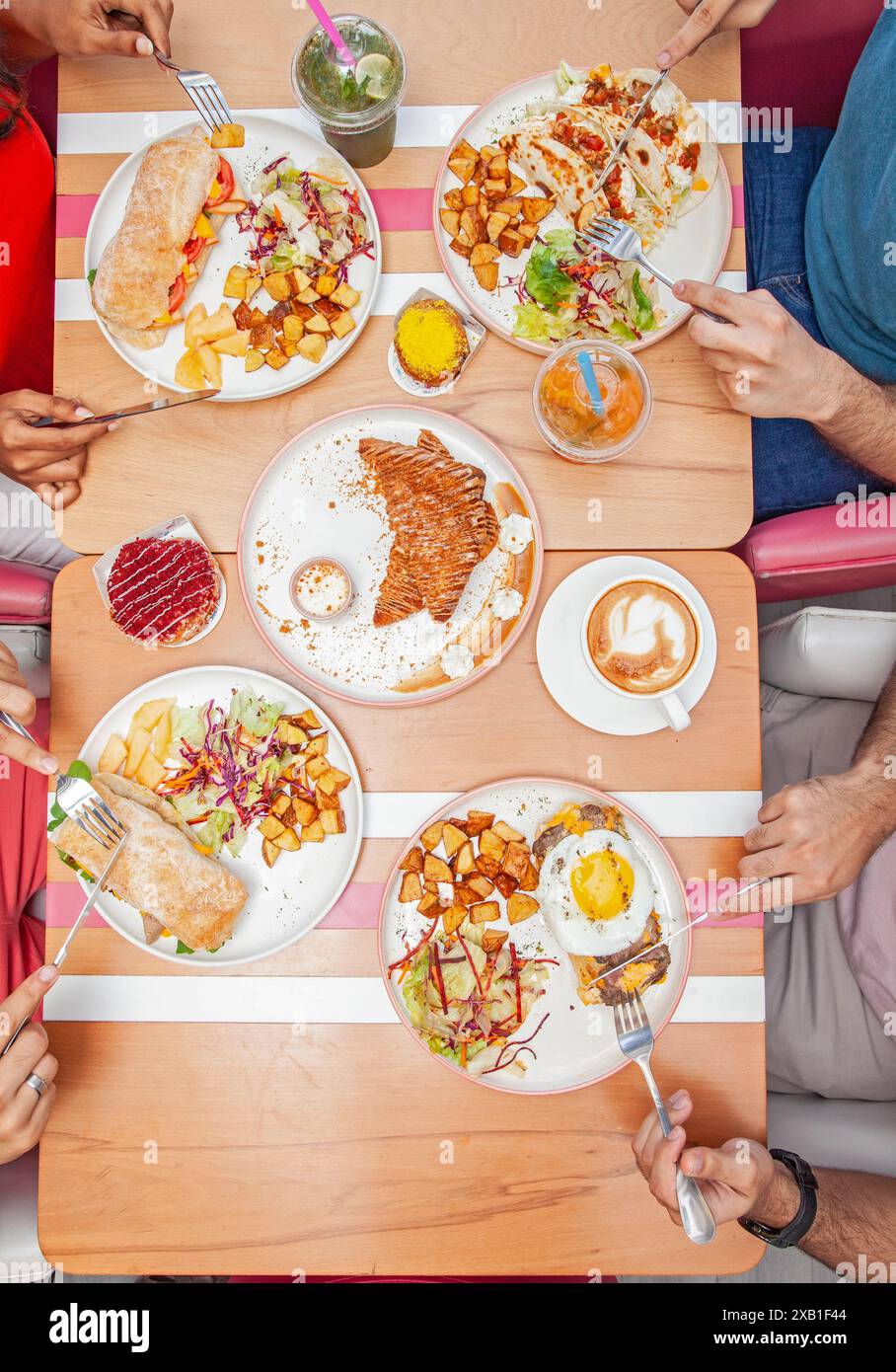 Friends having dinner overhead view hi-res stock photography and images ...