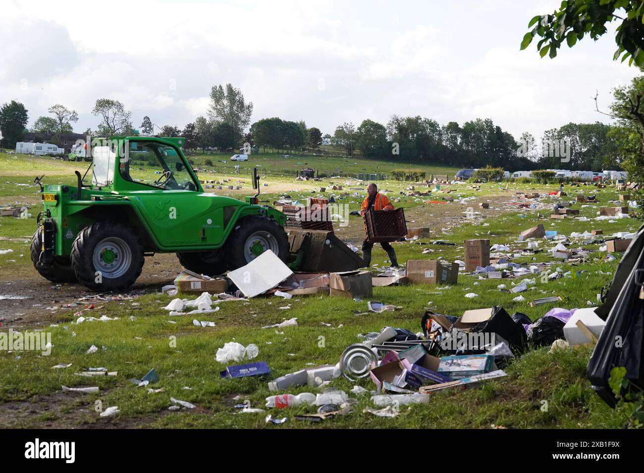 Rubbish being cleared in a field at the end of the Appleby Horse Fair ...