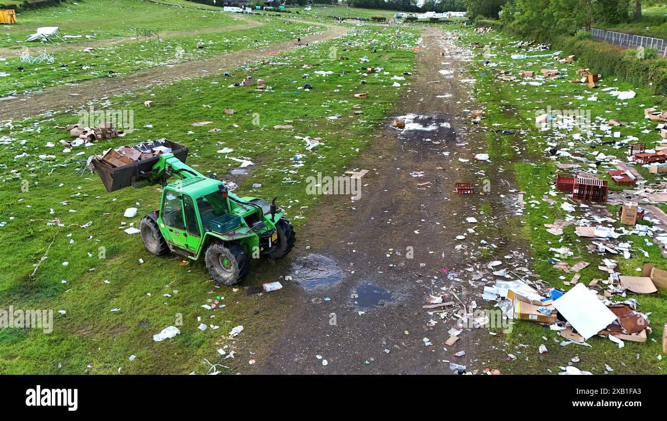 Rubbish being cleared in a field at the end of the Appleby Horse Fair ...