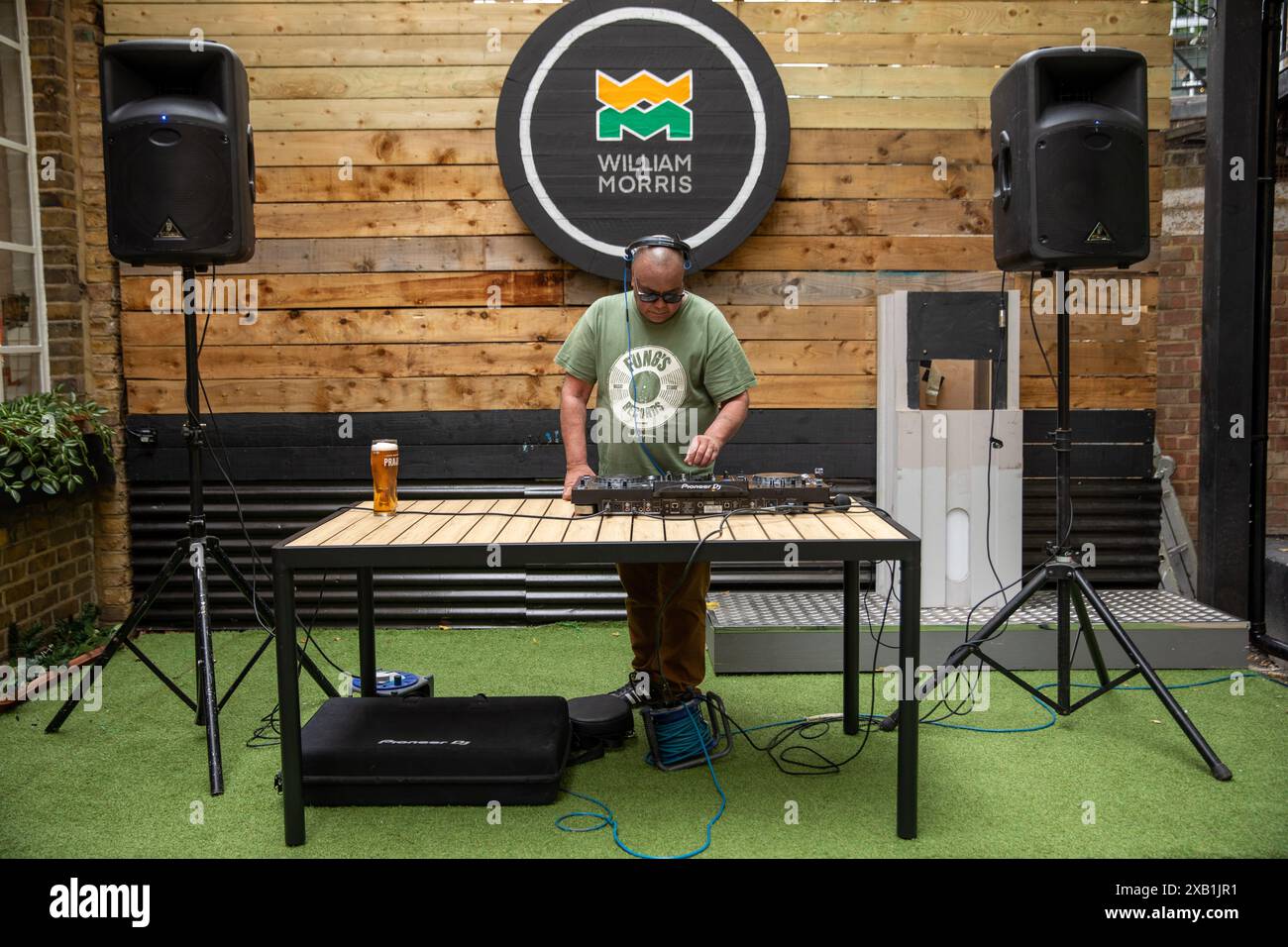 London, UK. 09th June, 2024. DJ Rob Thung stands over a set of mixing ...