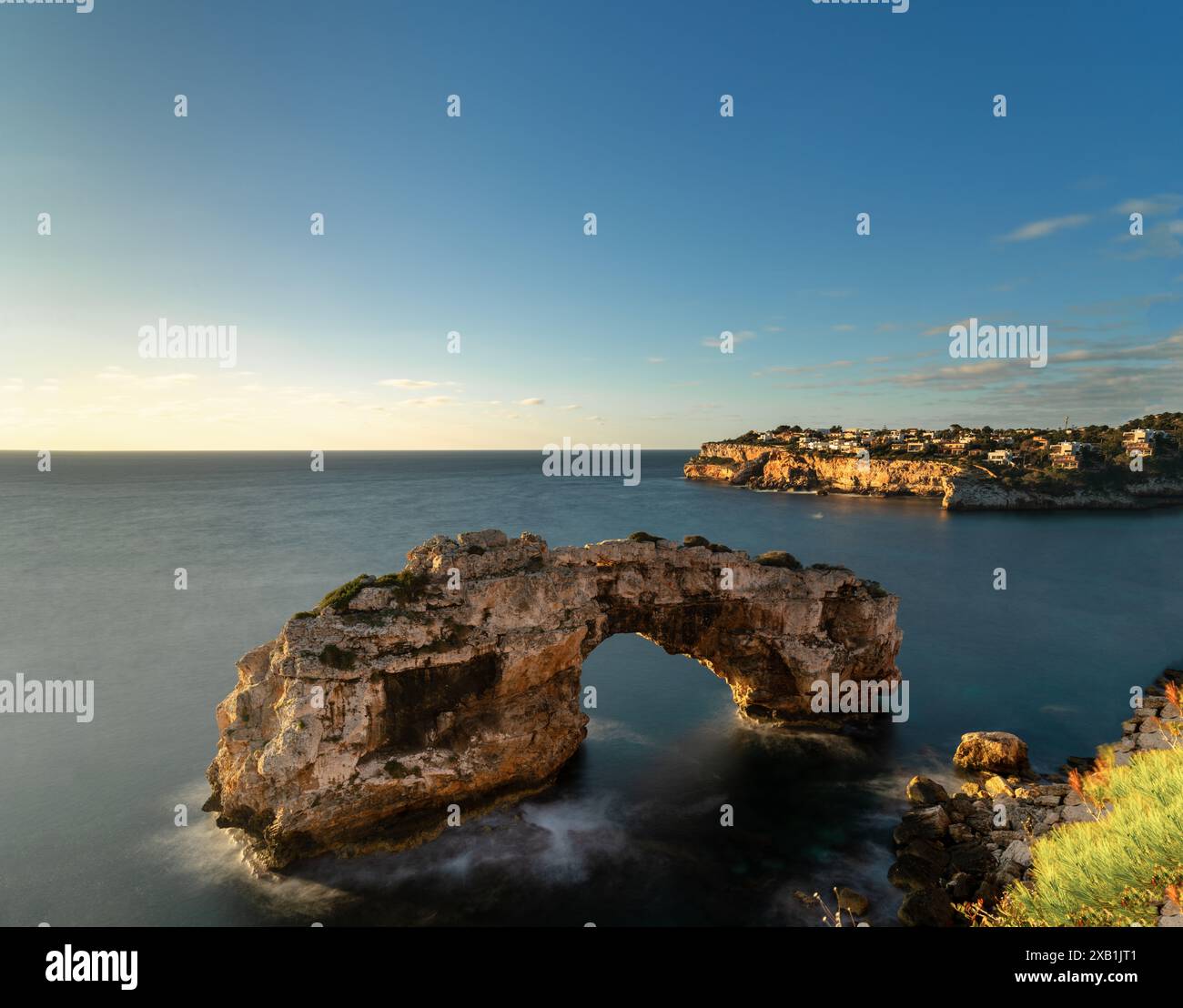 A long exposure view of the natural limestone arch of Es Pontas on ...