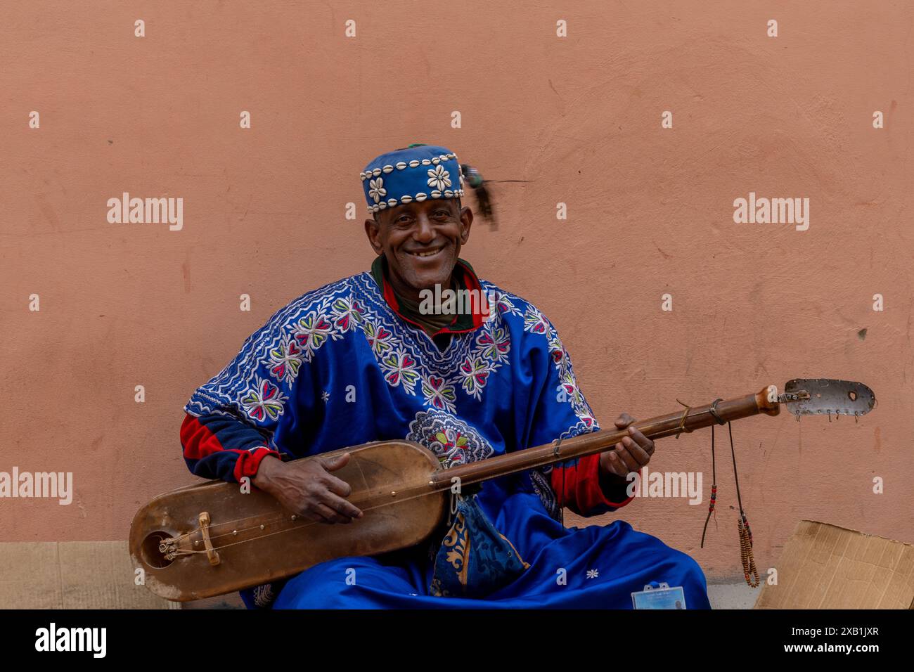 Marrakesh, Morocco - 23 March, 2024: street musician playing a West ...