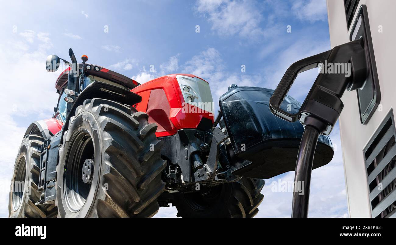 Electric vehicles charging station on a background of agricultural ...