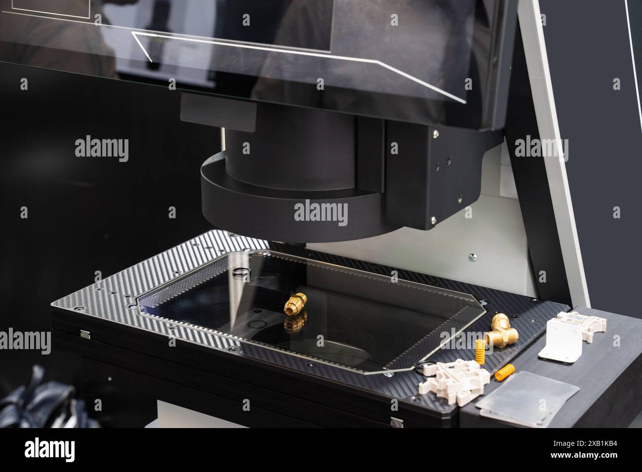 Optic machine for precise measurement of part size and quality ...