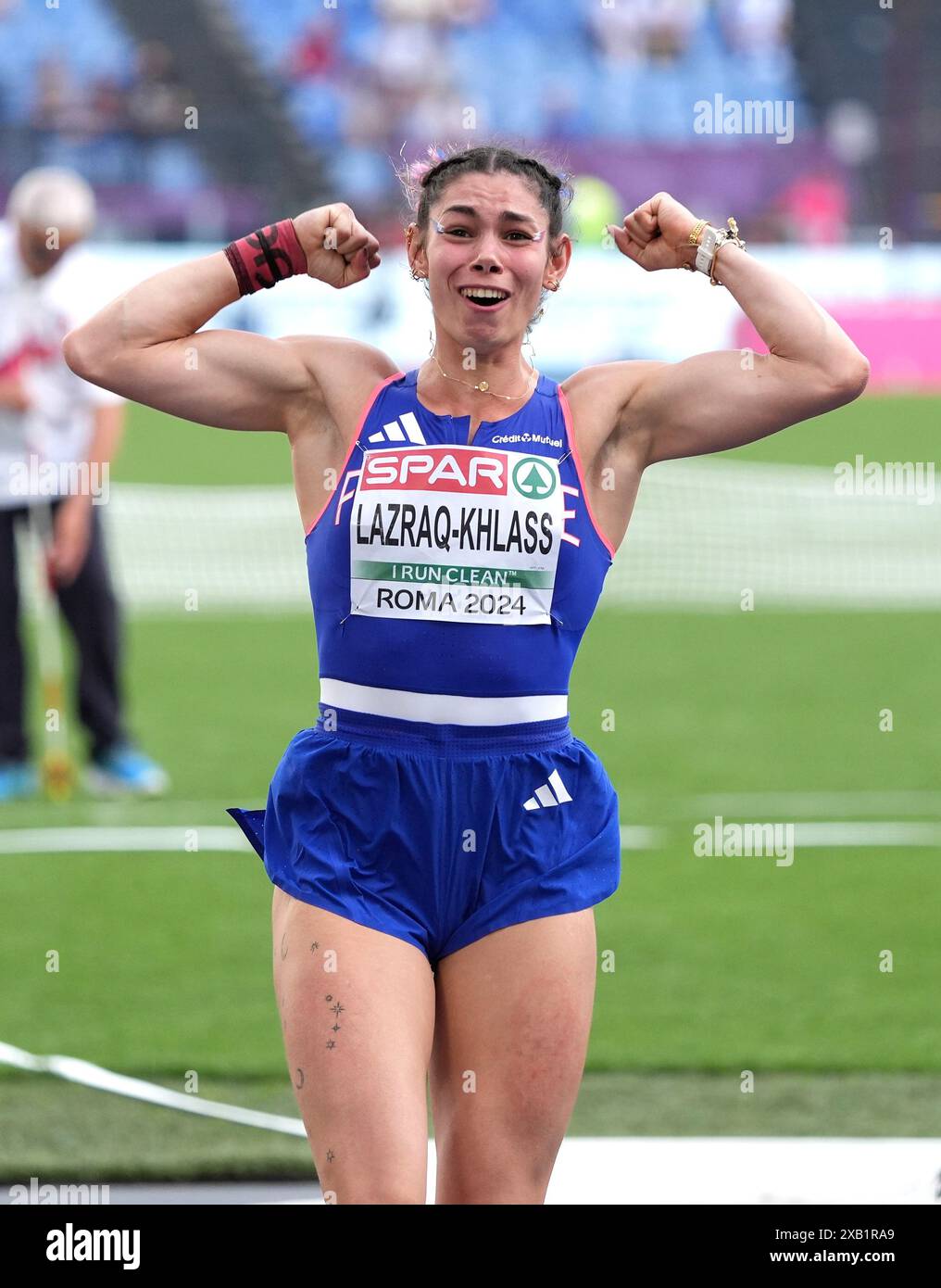 Auriana Lazraq-Khlass of France is cheering after a successful attempt in shot put during the ...
