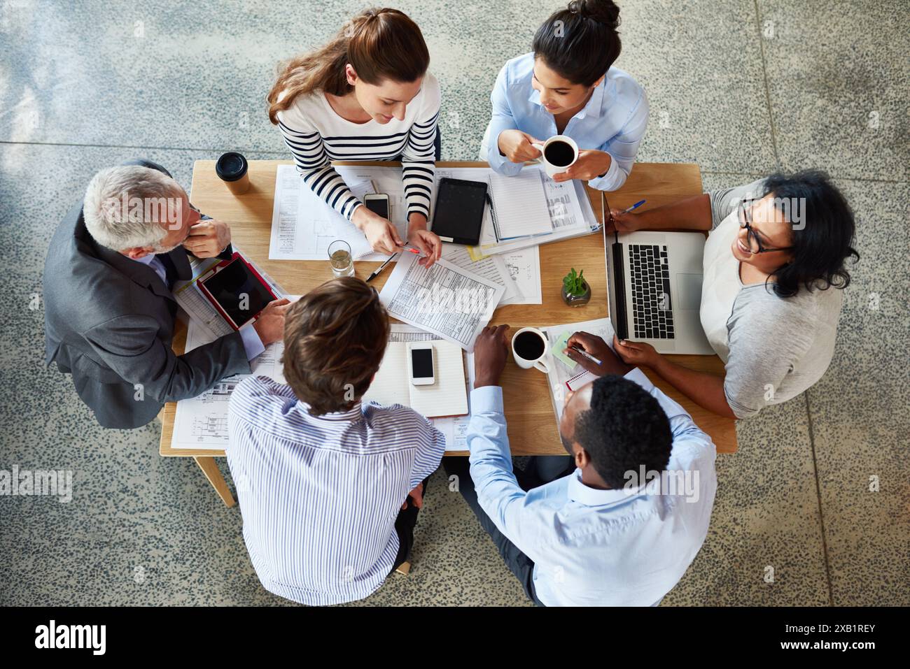 Top view, business people and collaboration in meeting, teamwork and ...