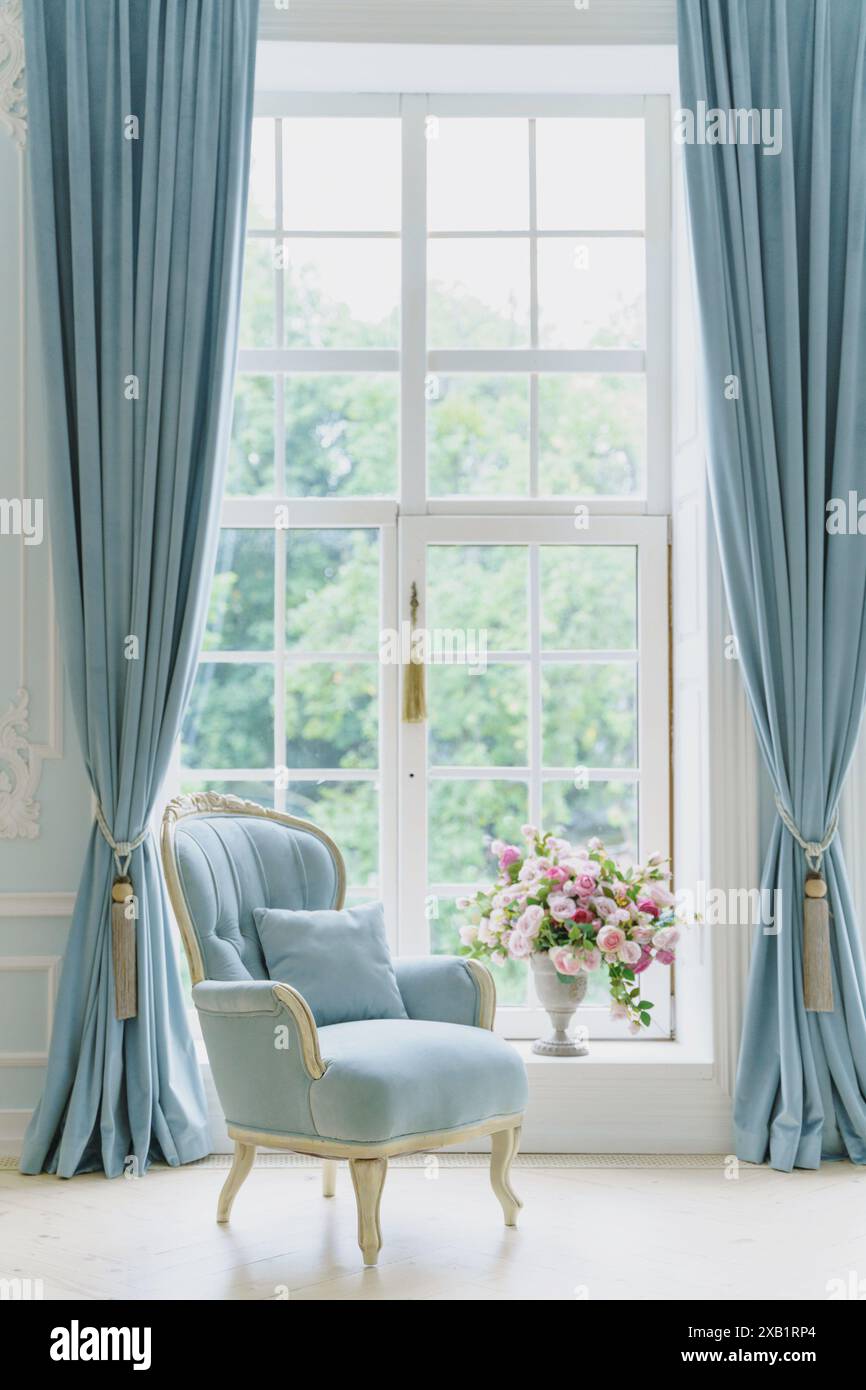 cozy light blue interior of the living room with chic beautiful antique ...
