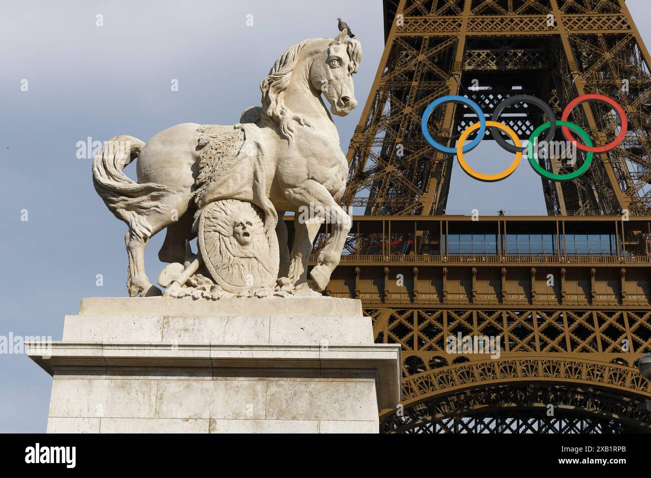 Olympic rings on the Eiffel Tower. Paris, France. Credit: Gerard ...