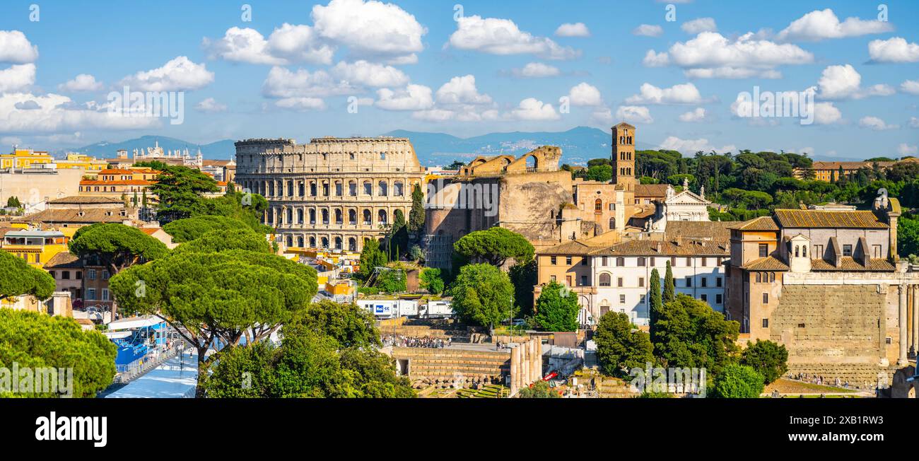 A panoramic view of the Roman Forum and Colosseum in Rome, Italy. The ...
