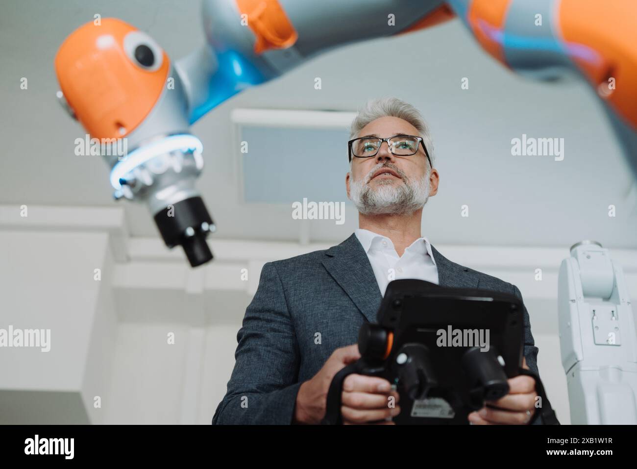 Automation, robotics engineer working on robotic knee replacement ...