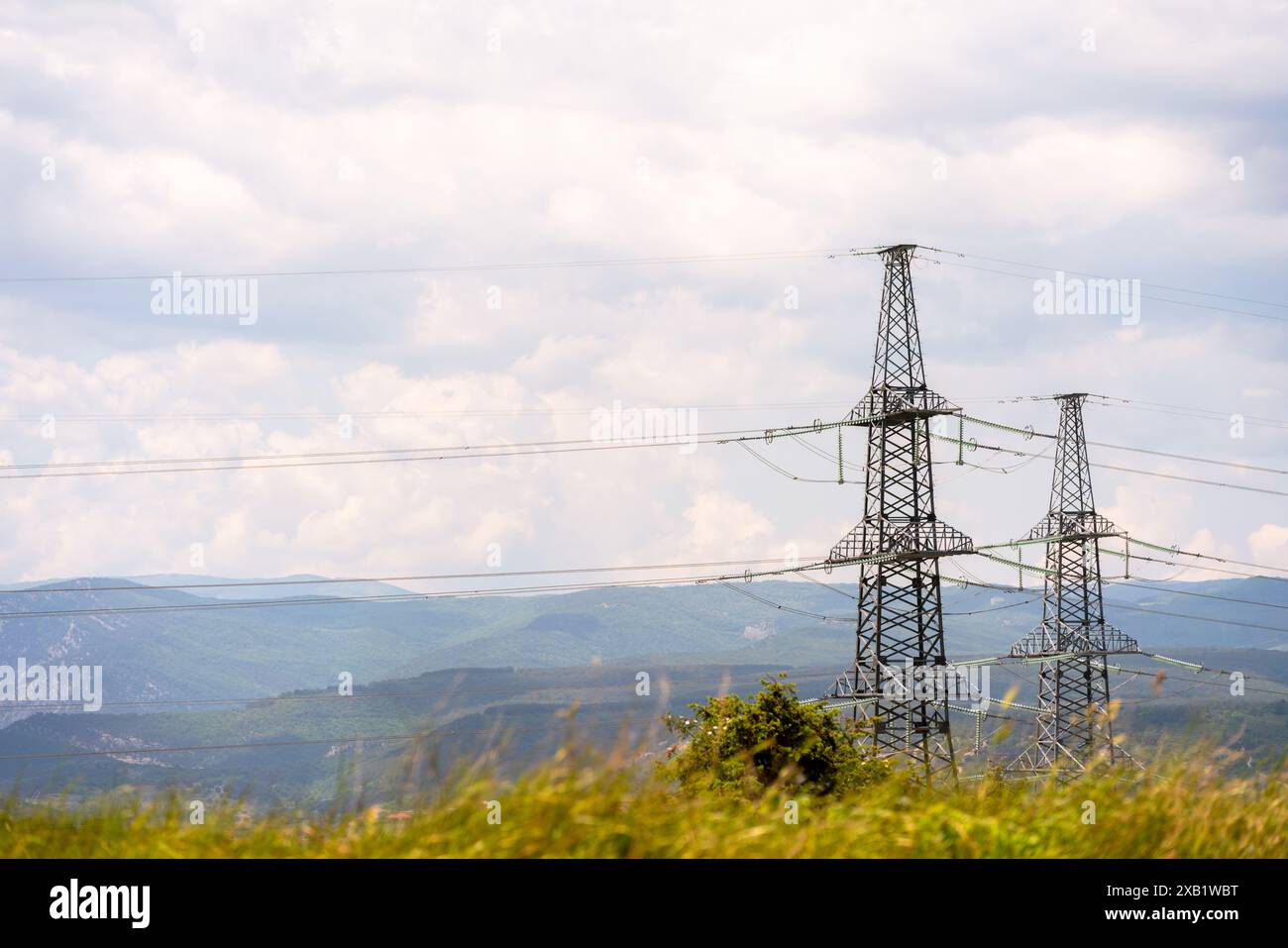 High voltage towers Electric pole. Power line support with wires for ...