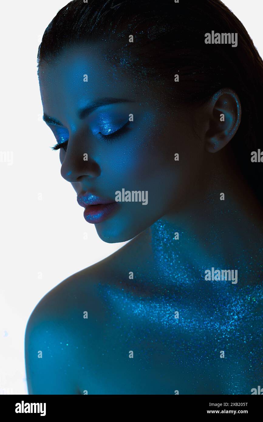 Beauty young womans profile, soft blue light, makeup face cosmetic ...